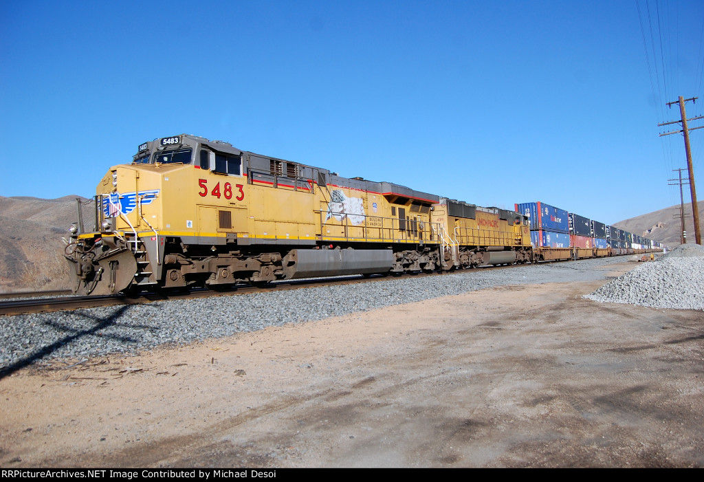 UP C45ACCTE #5483 leads an eastbound stack train at Echo, UT. March 10, 2015